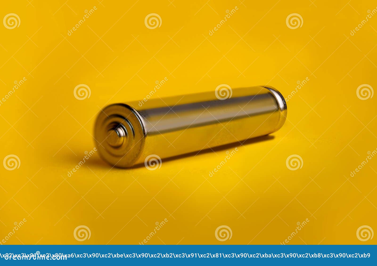 Metal AAA Battery on a Yellow Background Close-up Stock Photo - Image ...