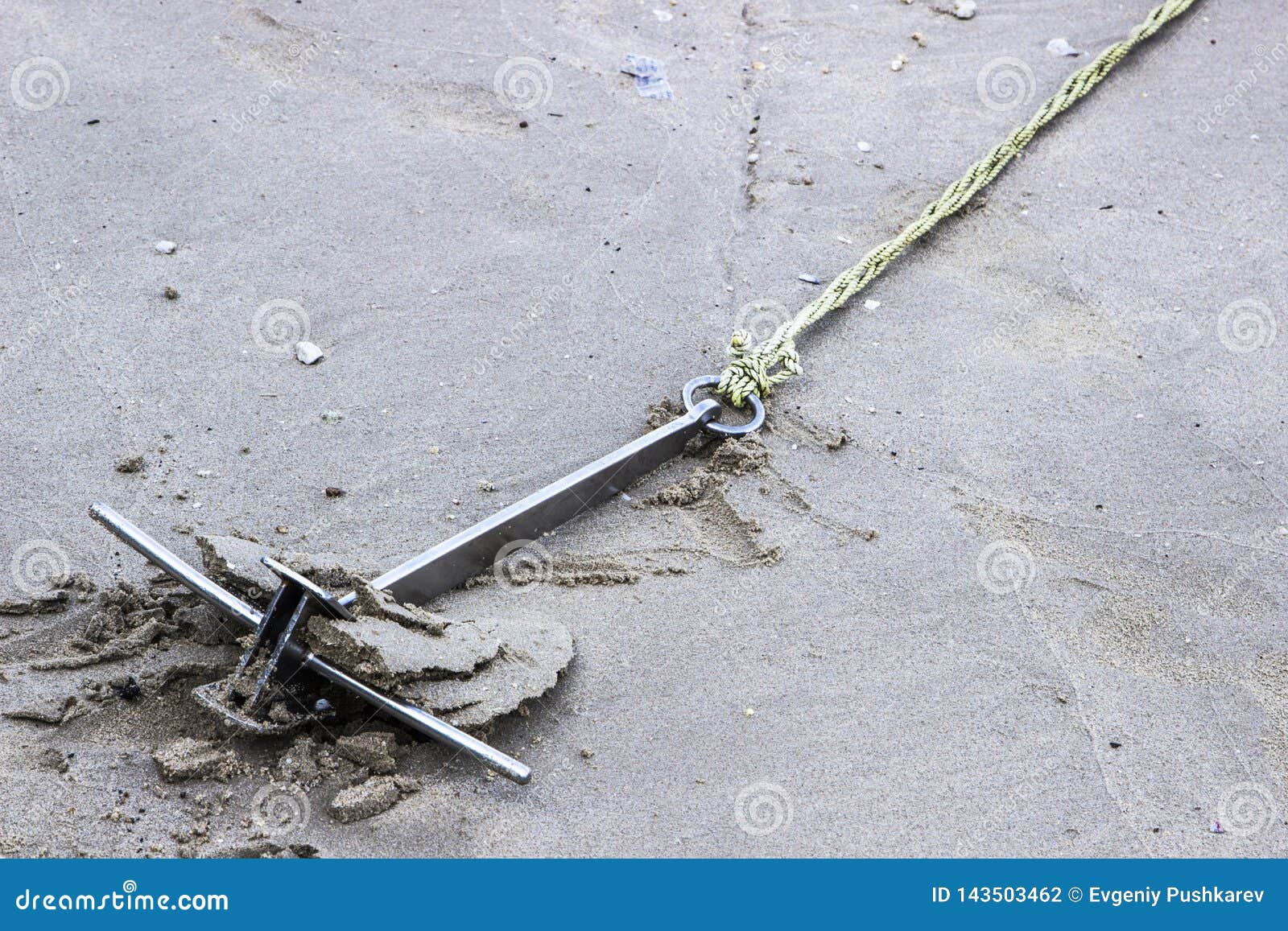 Metal Anchor with a Tied Rope on the Sand Stock Photo - Image of ...