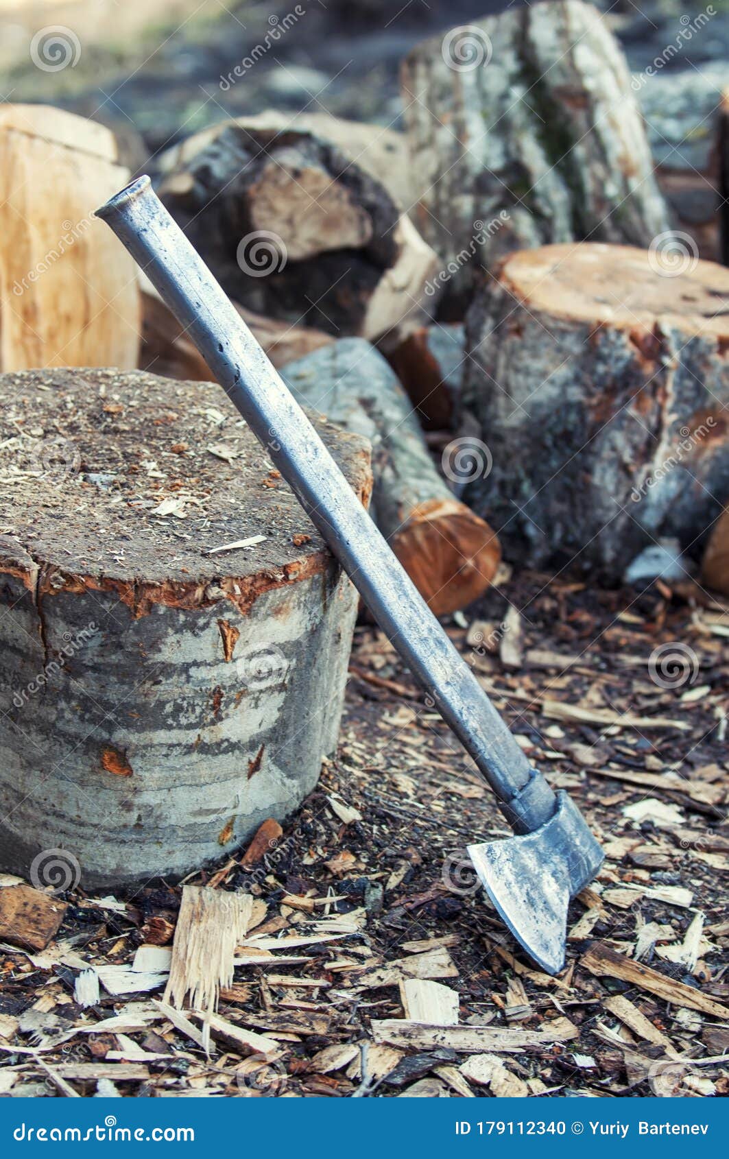 Metal axe for cutting logs stock photo. Image of block - 179112340