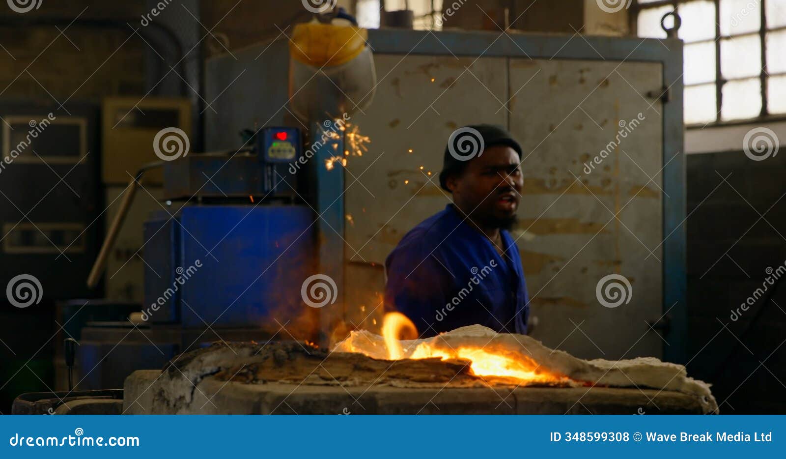 Metal Being Melted in Furnace at Workshop Stock Photo - Image of ...