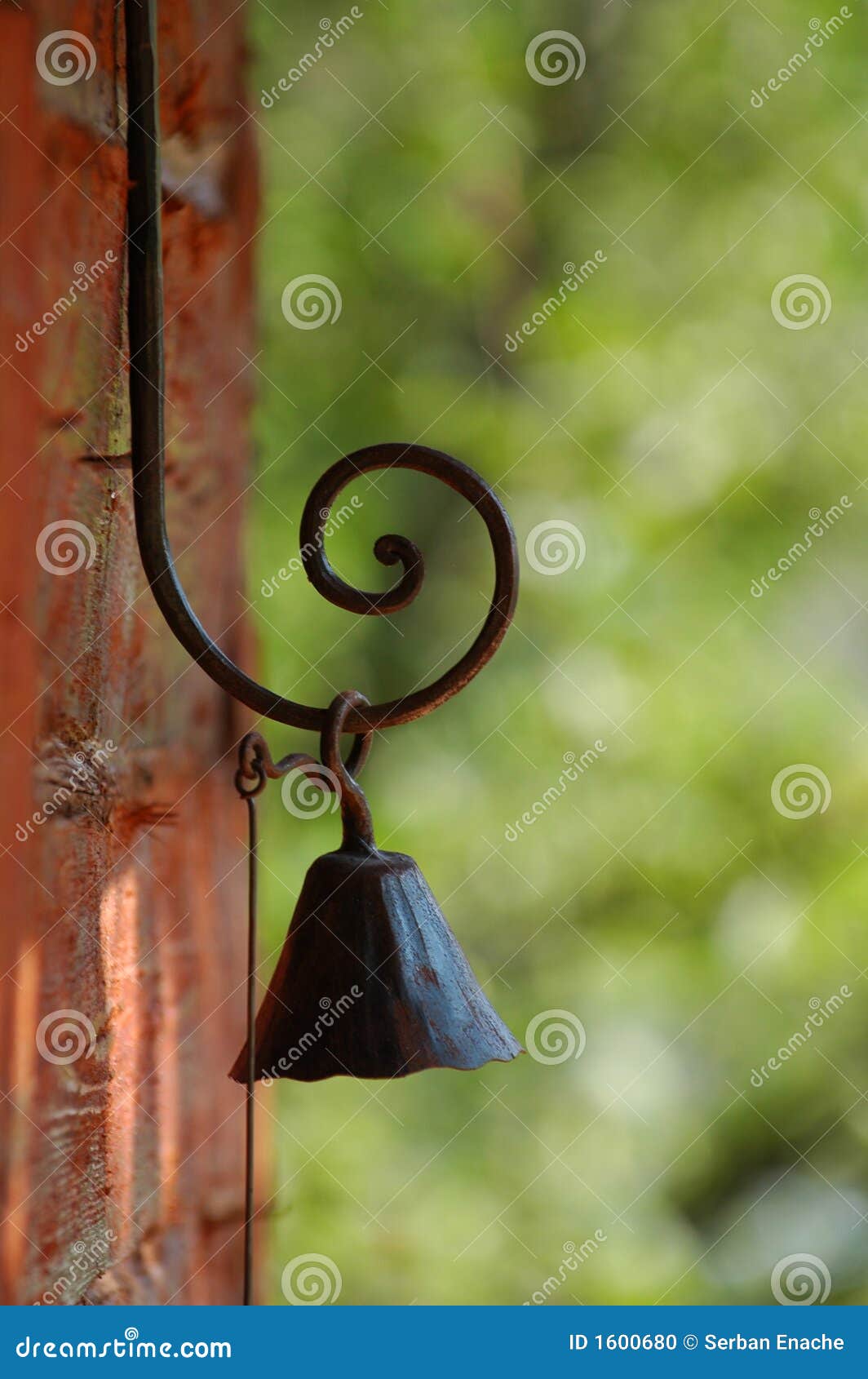Big Old Metal Bell With Glued Sheets With Wishes And Ancient Statue In ...