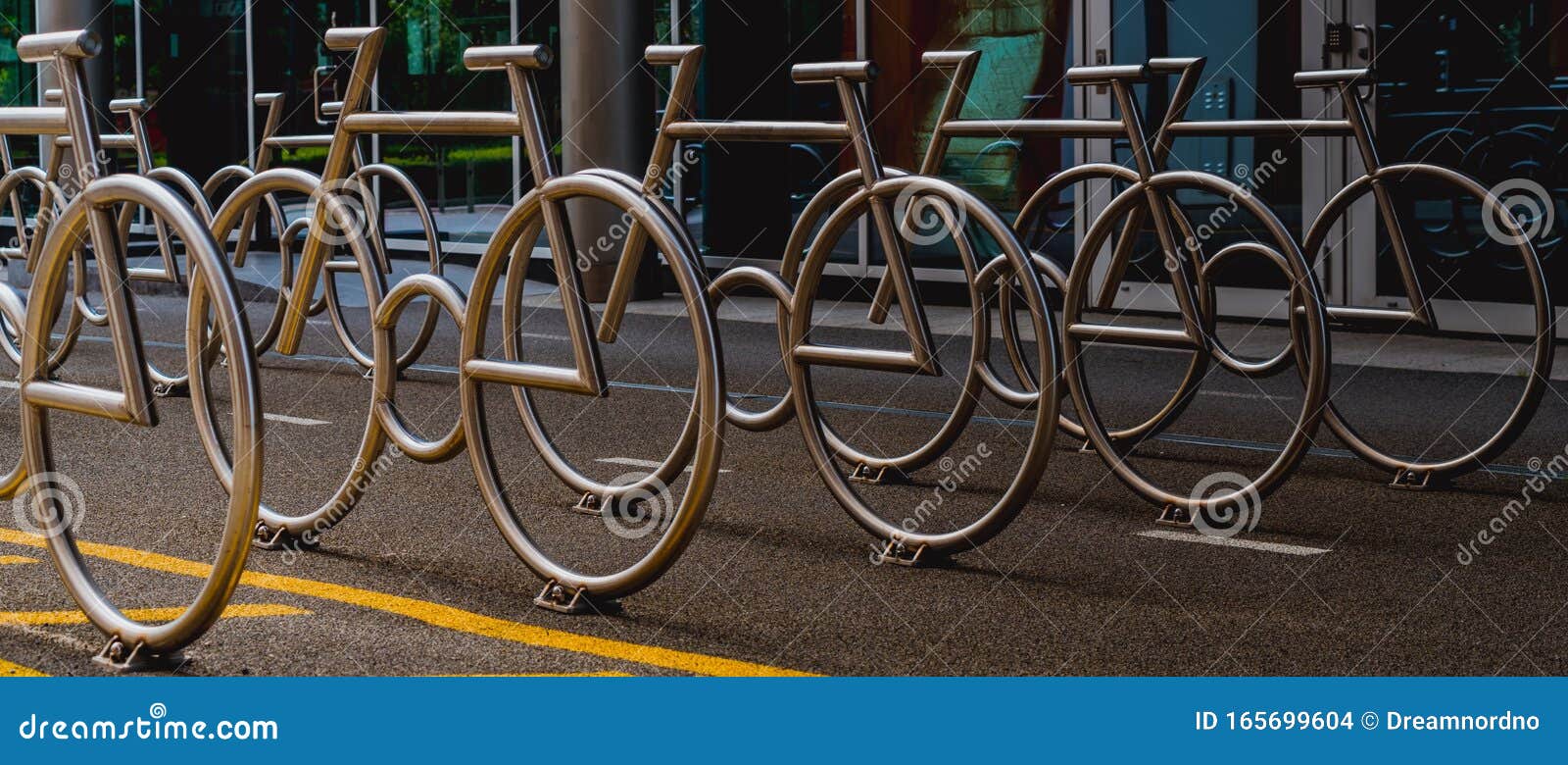 Metal Bike Racks Made in the Shape of Bicycles Stock Photo - Image of ...