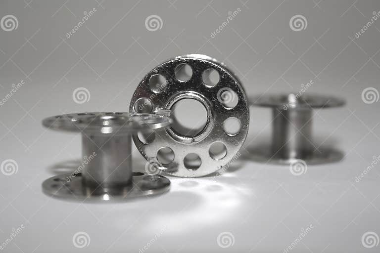 Metal bobbins stock image. Image of silver, alterations - 12707169