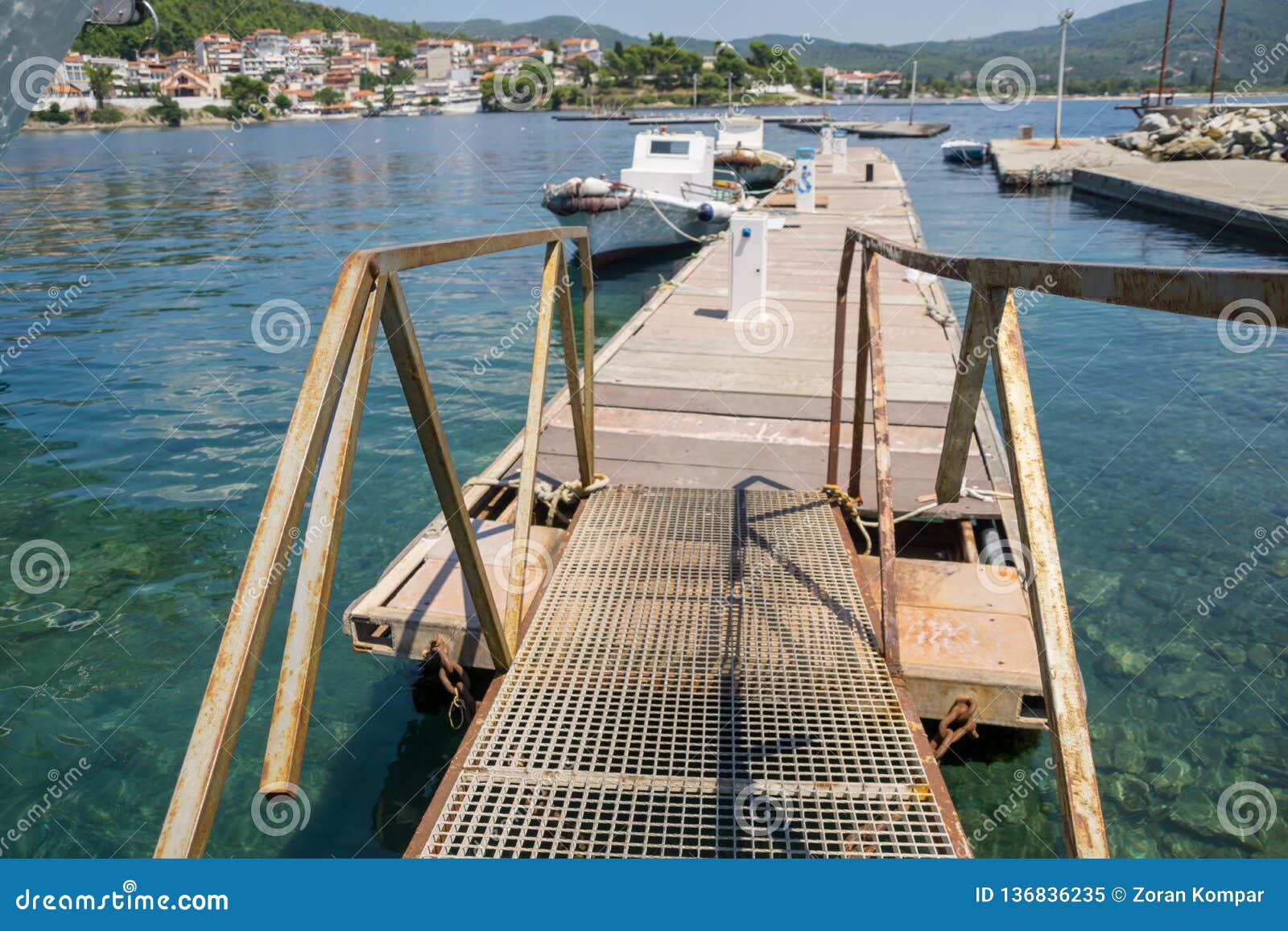 A Metal Bridge Leading To the Dock with Boats Stock Image - Image of ...