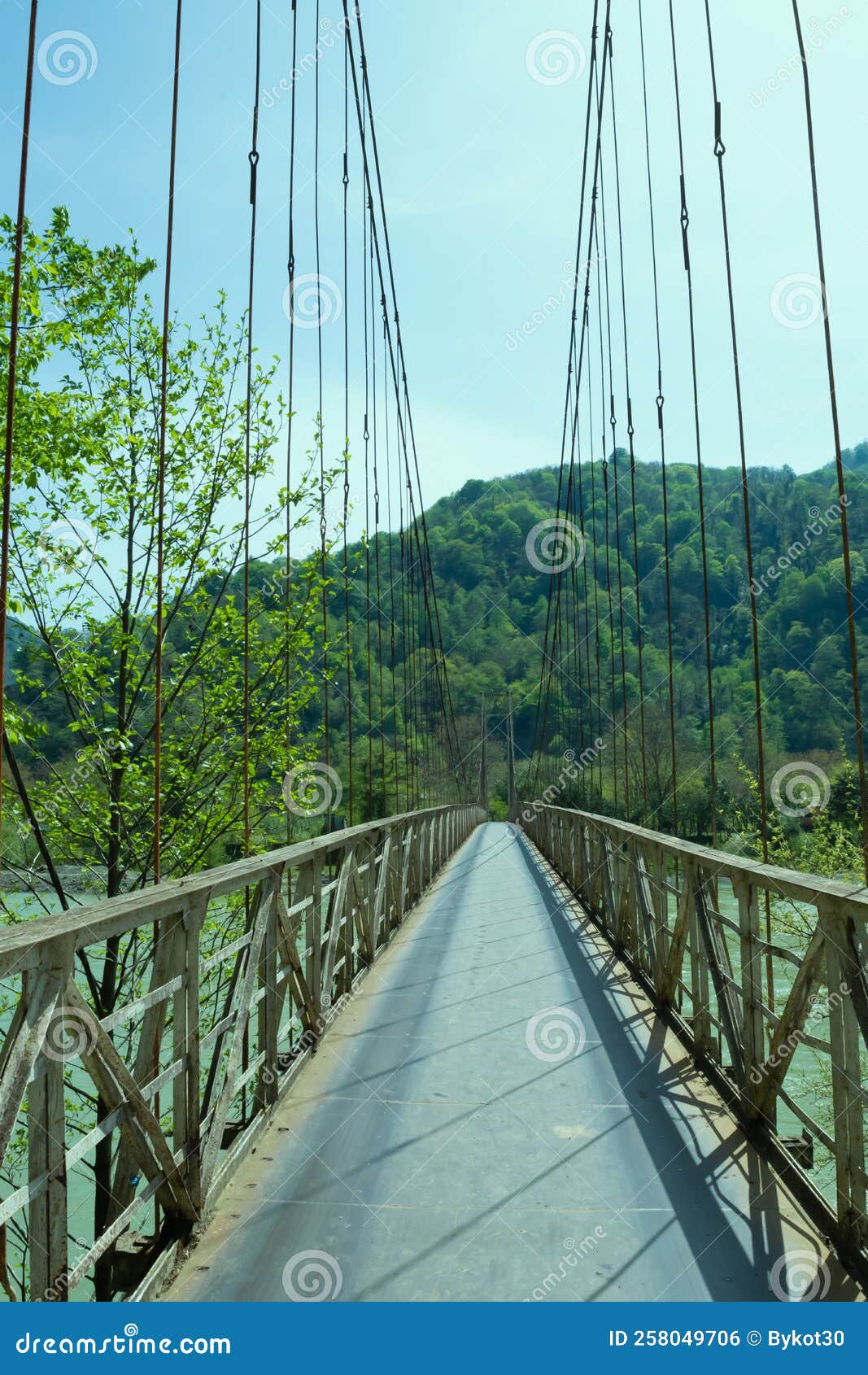 Metal Bridge Over a Mountain River. Beautiful Mountain Landscape Stock ...