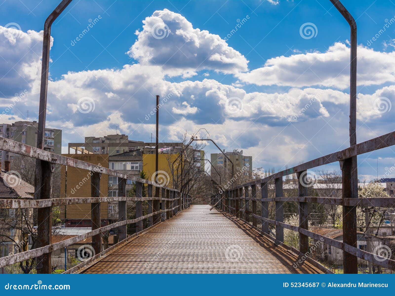Metal Bridge Over Train Tracks Stock Image - Image of bridge, people ...