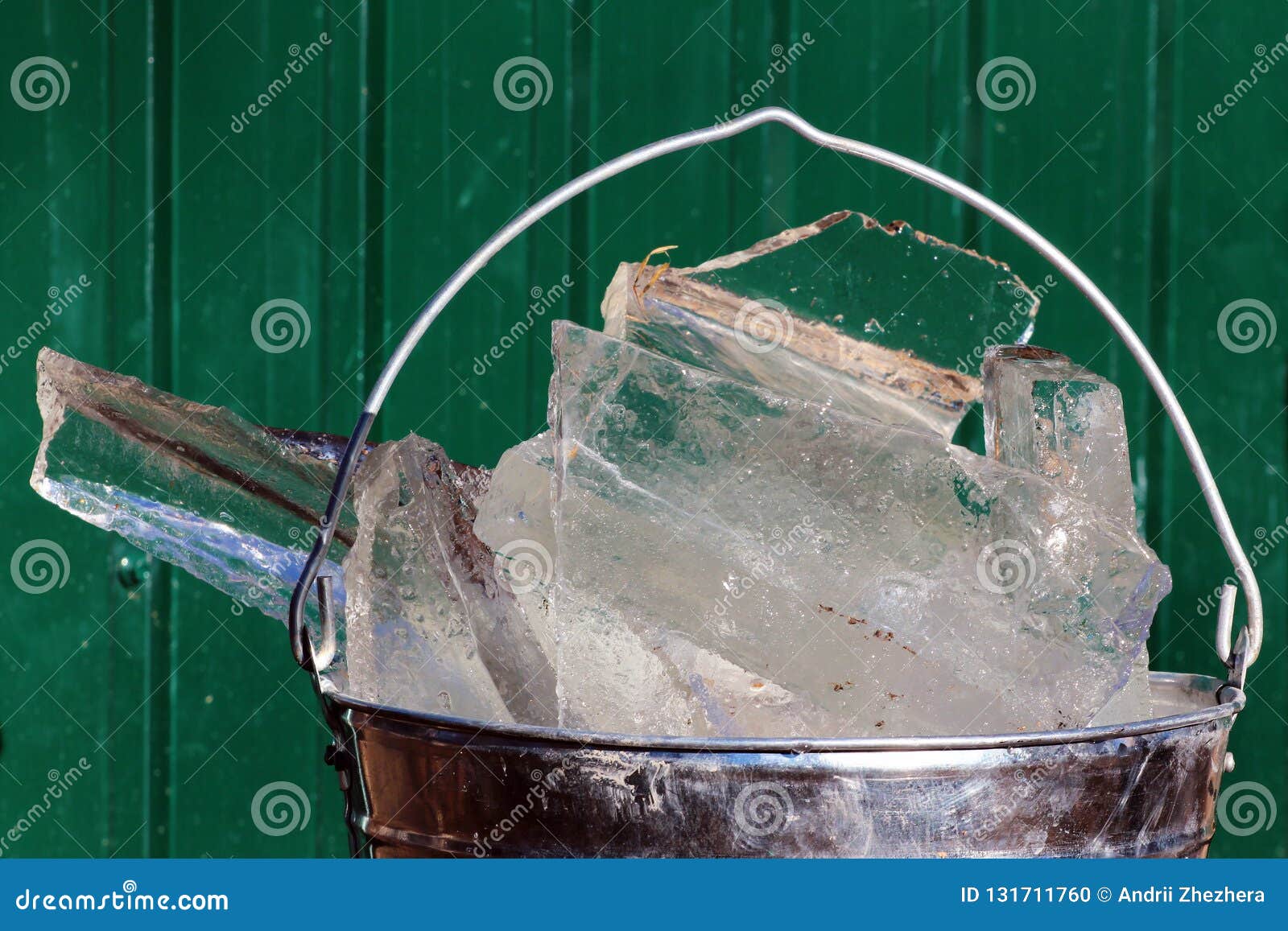 Metal bucket with ice stock photo. Image of winter, transparent - 131711760