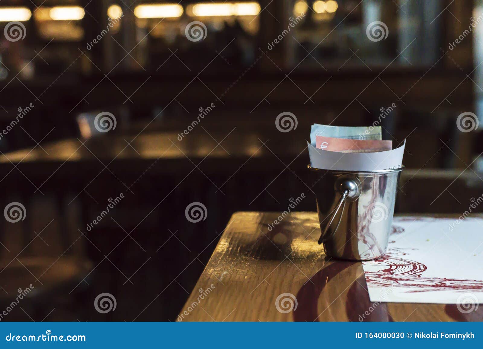 A Metal Bucket with a Tip on the Table in an Italian Restaurant in a ...