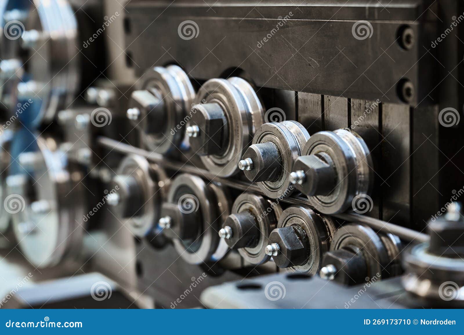 Metal Cable Pulled Out through Rollers Line on Machine Tool Stock Photo ...