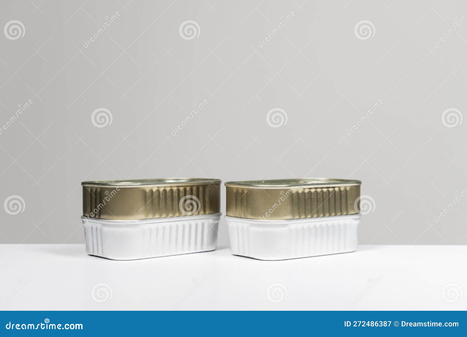 Metal Canned Fish Cans of Different Types on a Smooth White Surface ...