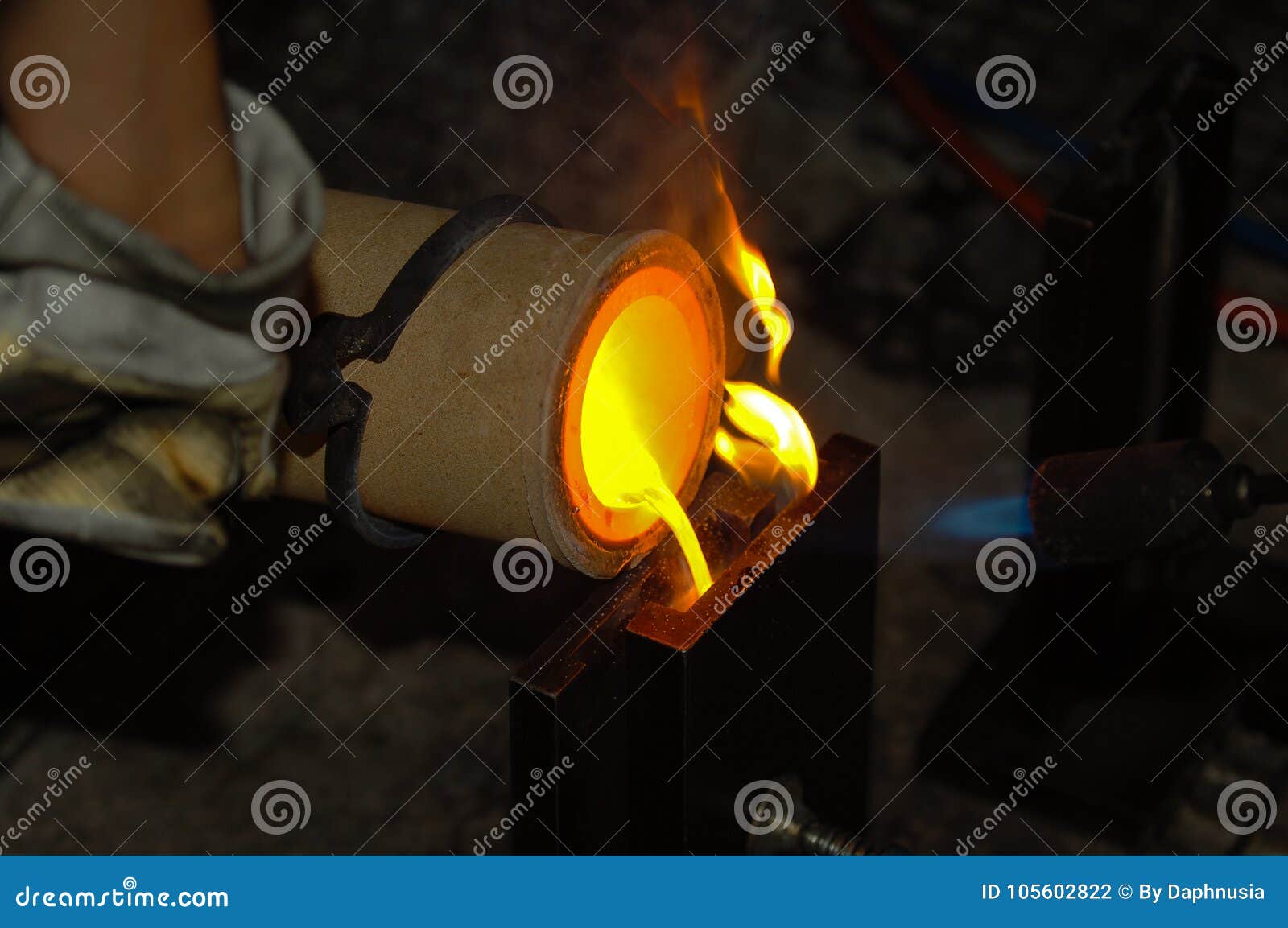Metal casting work stock photo. Image of glow, helmet - 105602822
