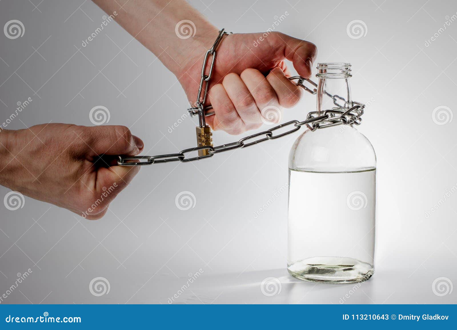 Bottle with Alcohol and Chain Stock Image - Image of background ...