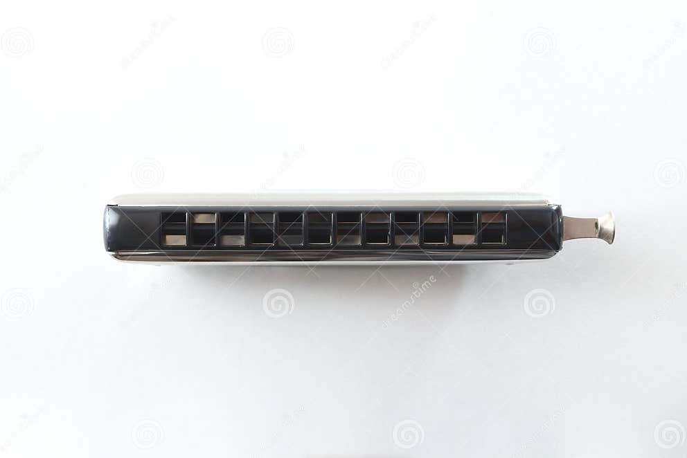 Metal Chromatic Harmonica Isolated on White Table Top View Stock Photo ...