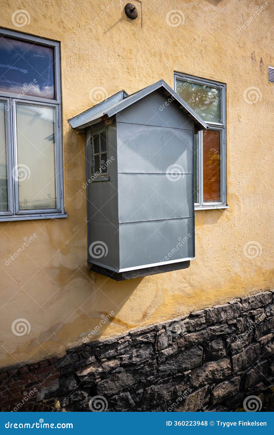 Metal-clad Bay Window on Textured Yellow Wall.. Stock Photo - Image of ...