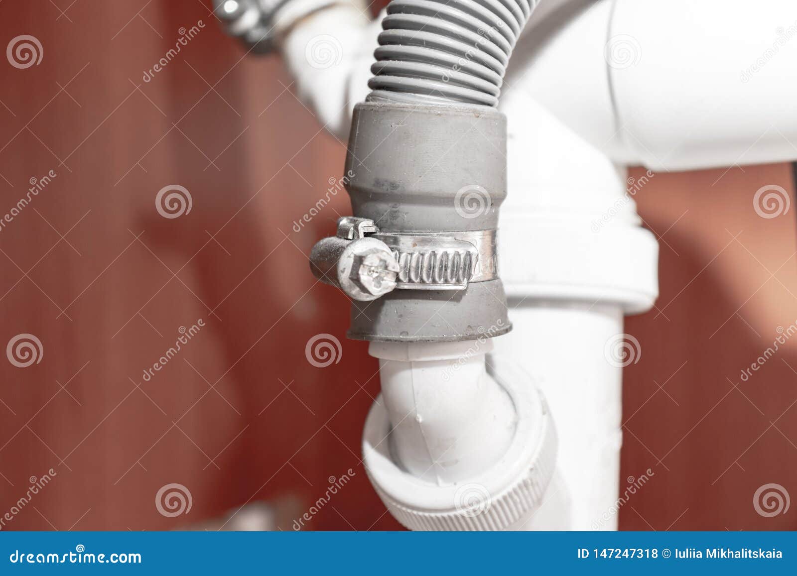 Metal Clamp For Connection Of Dishwasher Drain Hose Under Kitchen Sink