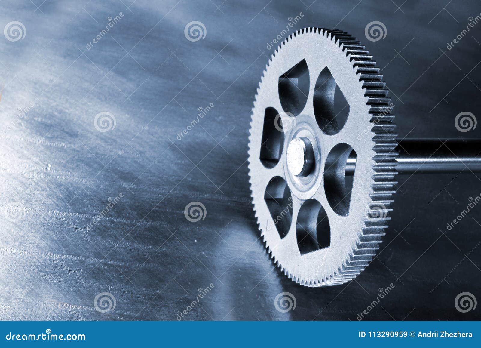 Metal Cogged Wheel on a Steel Surface Stock Image - Image of mechanical ...