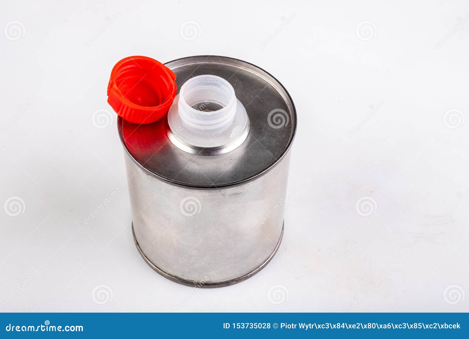Metal Container for Chemicals on a White Table. a Tin Plate with a ...