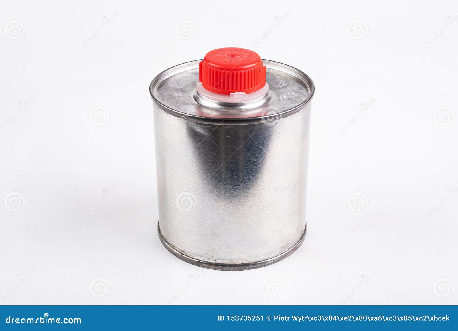Metal Container for Chemicals on a White Table. a Tin Plate with a ...