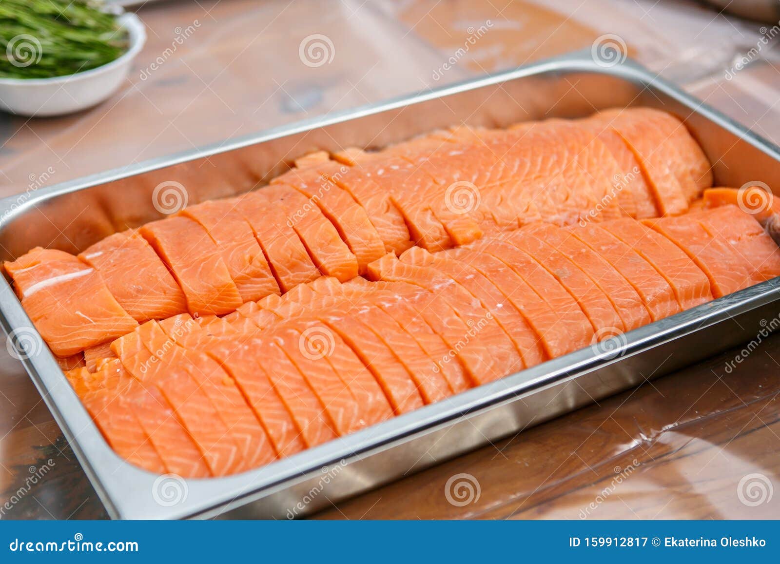 A Metal Container with Sliced Salmon Inside Stock Image - Image of ...