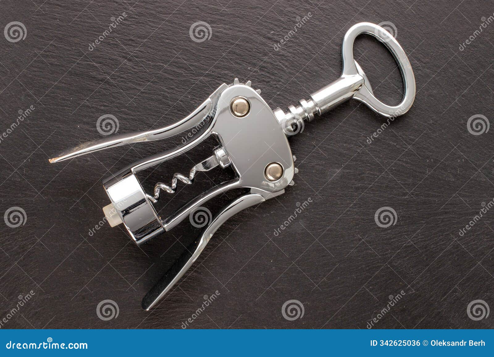 Metal Corkscrew on Slate Stone, Macro, Top View. a Corkscrew is a ...