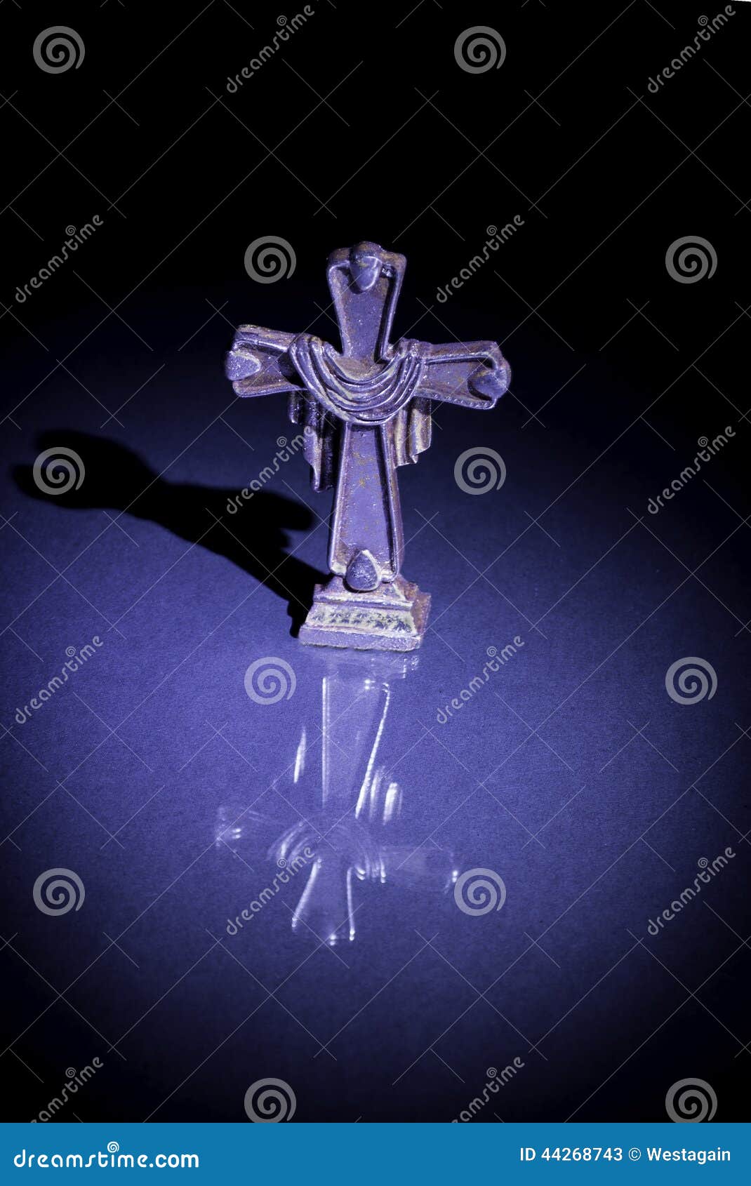 Metal Cross Reflected on Blue Background Stock Image - Image of blue ...