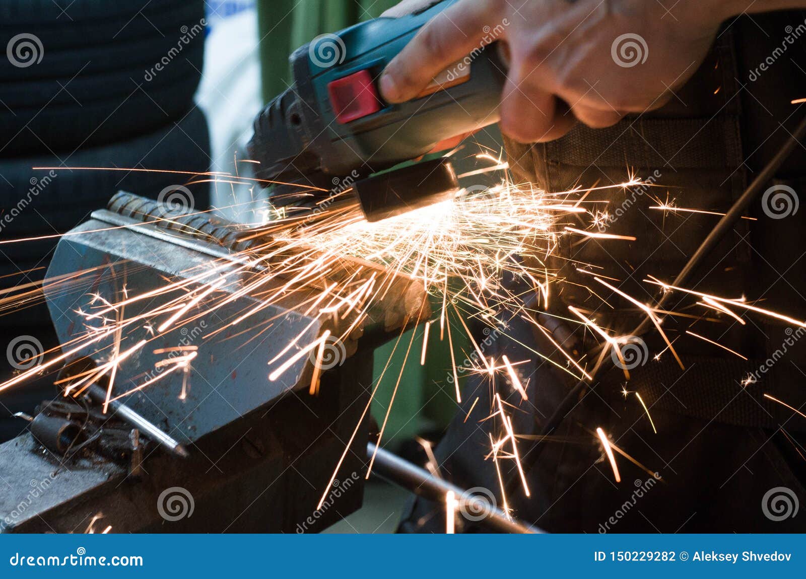 Metal Cutting with a Grinding Machine with Sparks. Stock Photo - Image ...