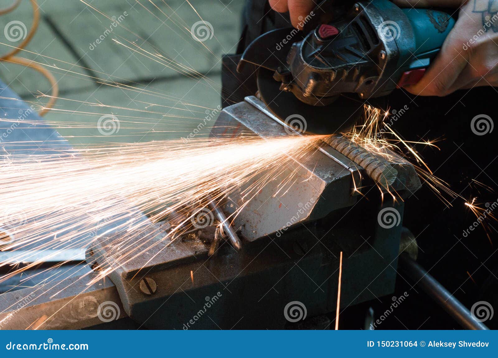 Metal Cutting with a Grinding Machine with Sparks. Stock Photo - Image ...