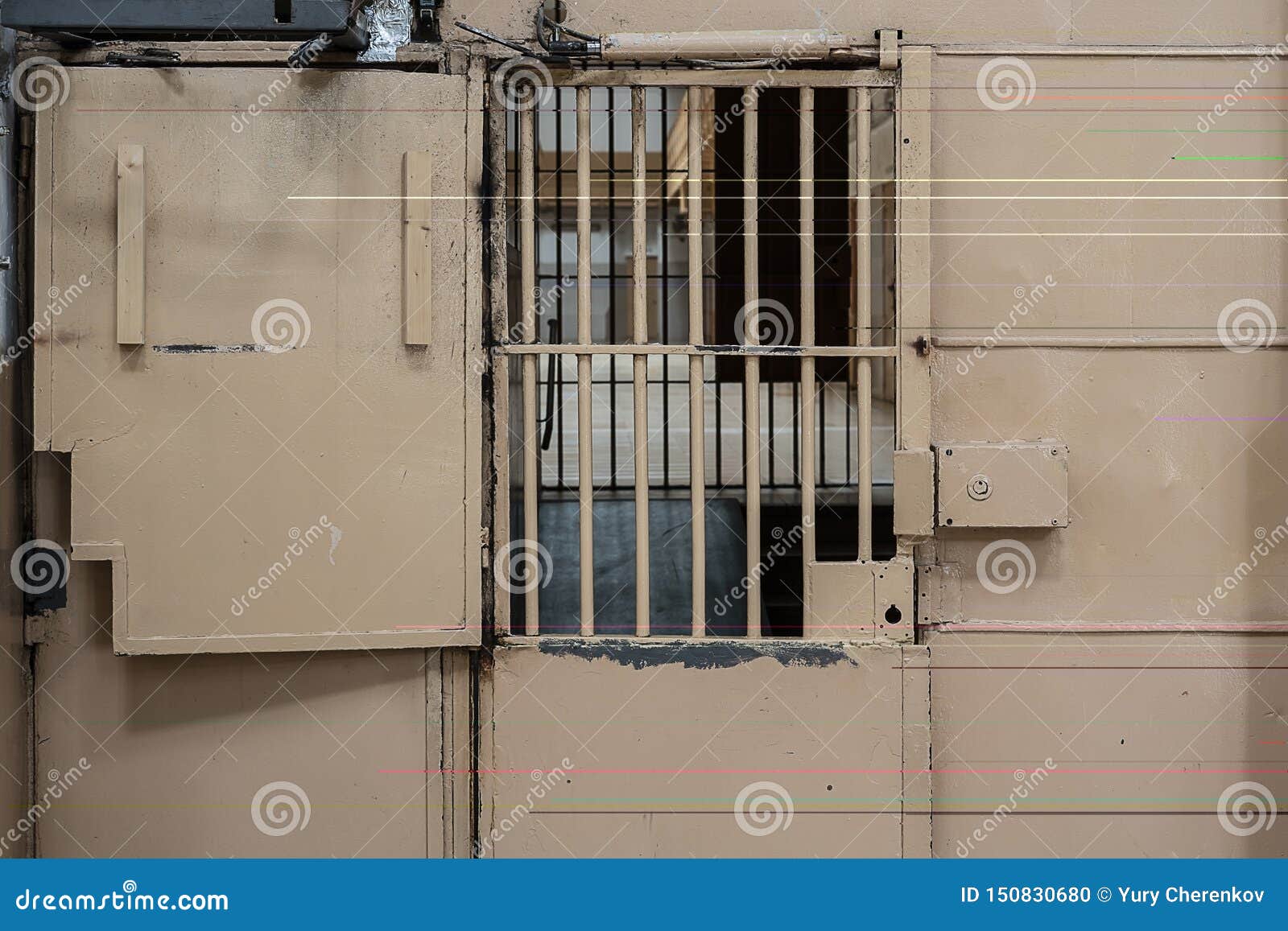 Metal Door in Prison with a Large Lock and Thick Bars Stock Photo ...