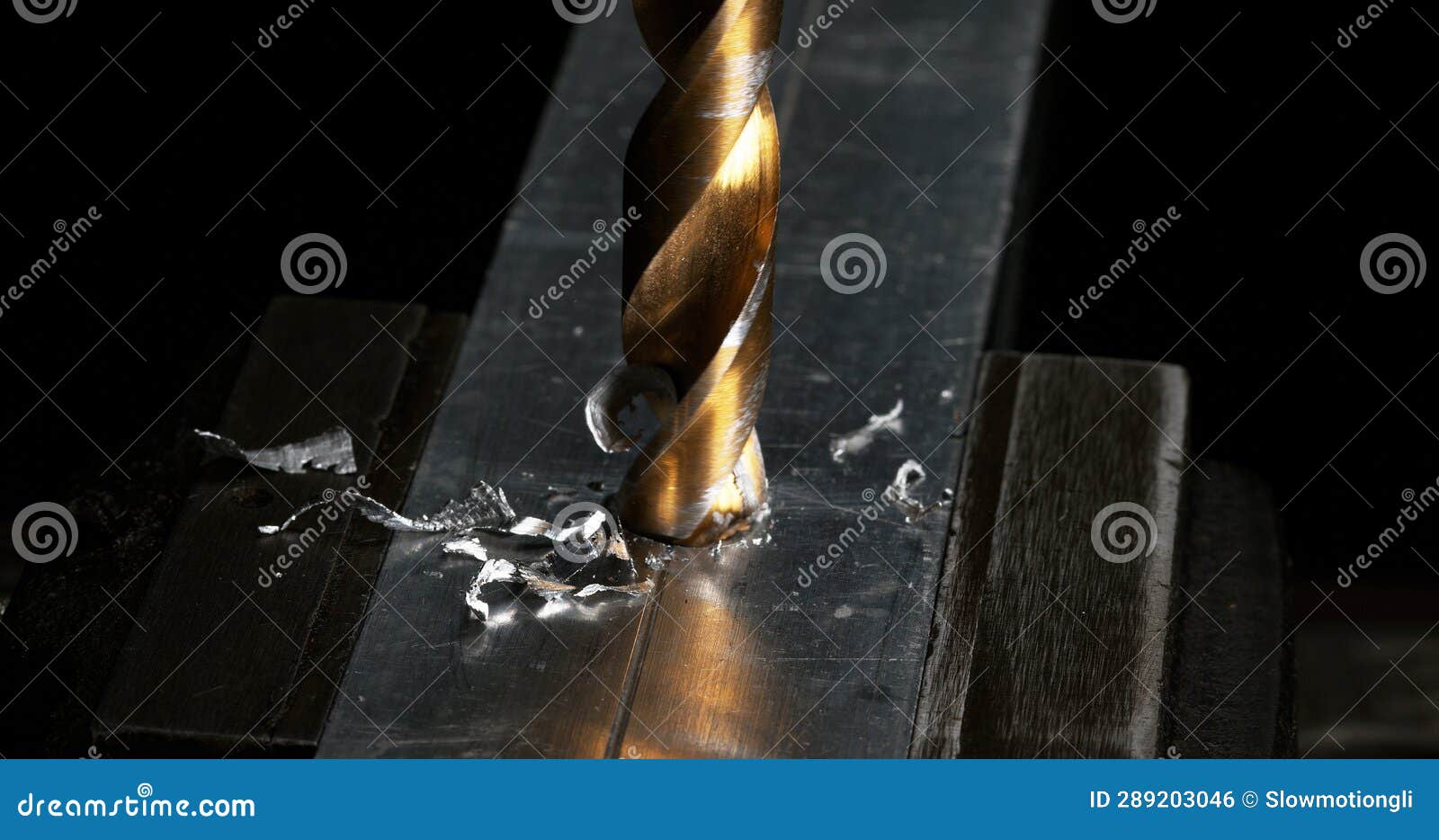 Metal Drill Turning on a Steel Plate Making Chips Stock Photo - Image ...