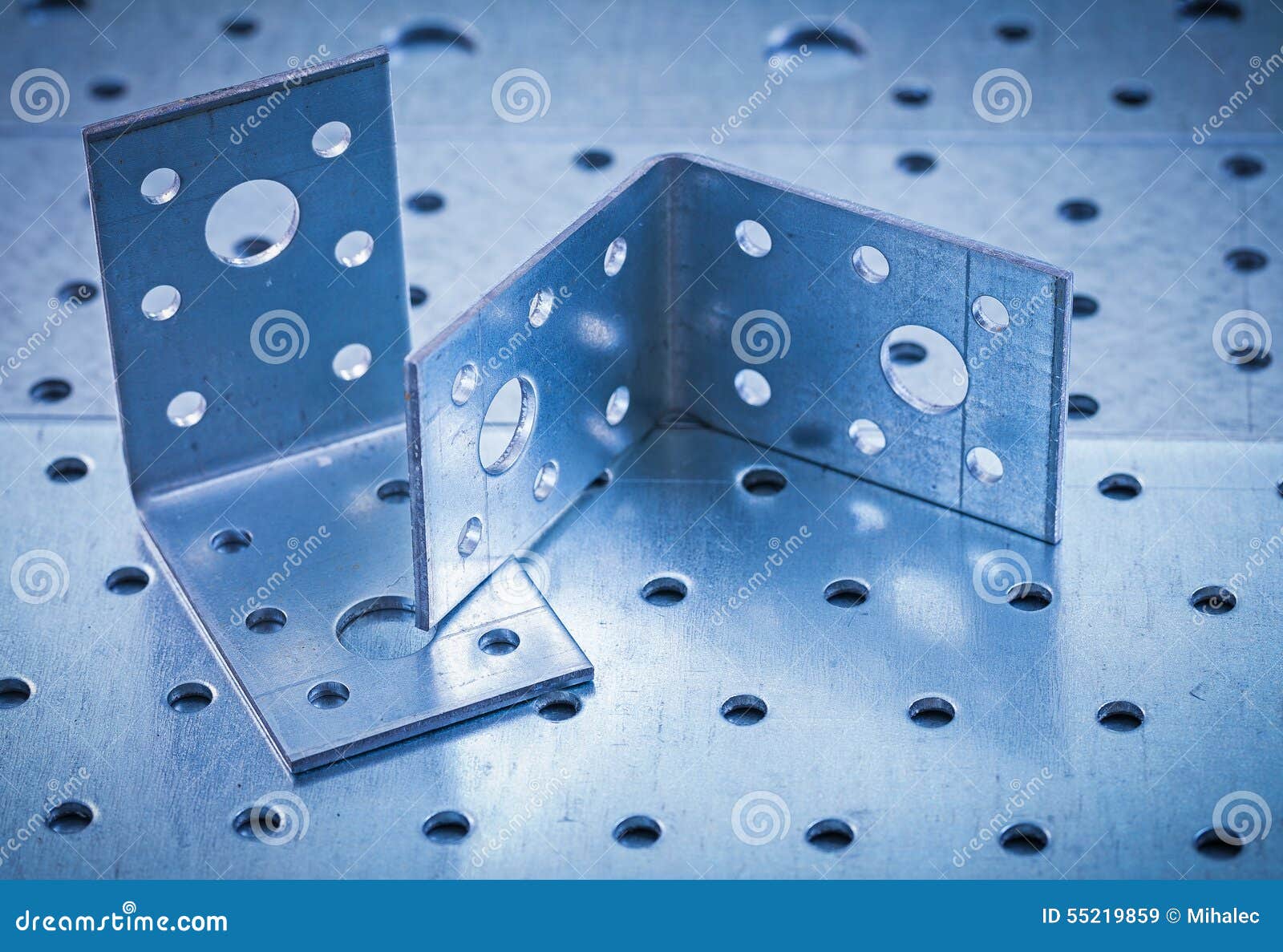 Metal Drilled Angle Bars on Perforated Metallic Stock Image - Image of ...