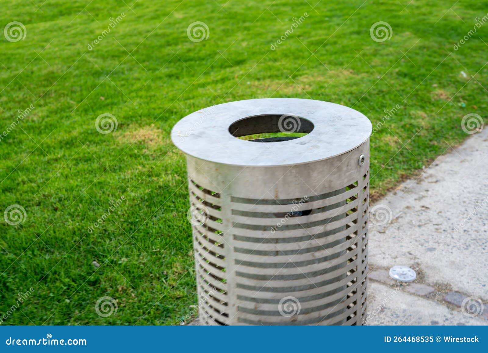 Metal Dustbin on the Sidewalk in the Street Stock Image - Image of ...
