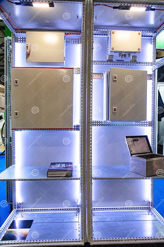 A Metal Electrical Panel with Circuit Breakers, Relays, and Terminal ...