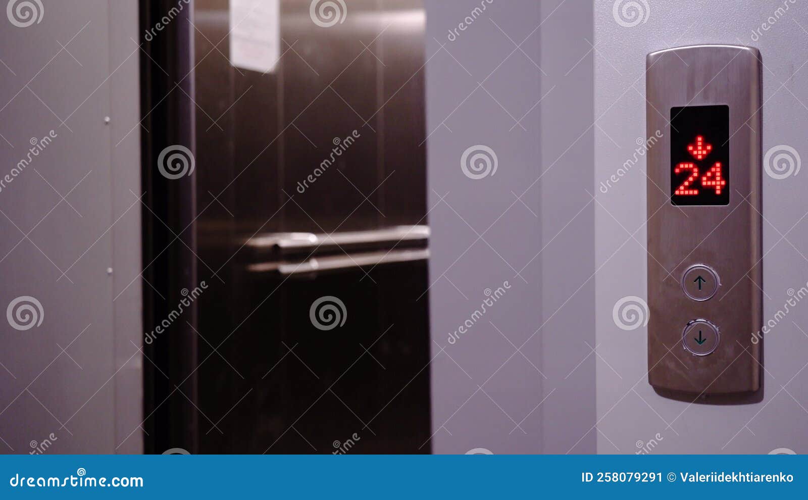 Metal Elevator Doors Open, with the Elevator Call Button in the ...