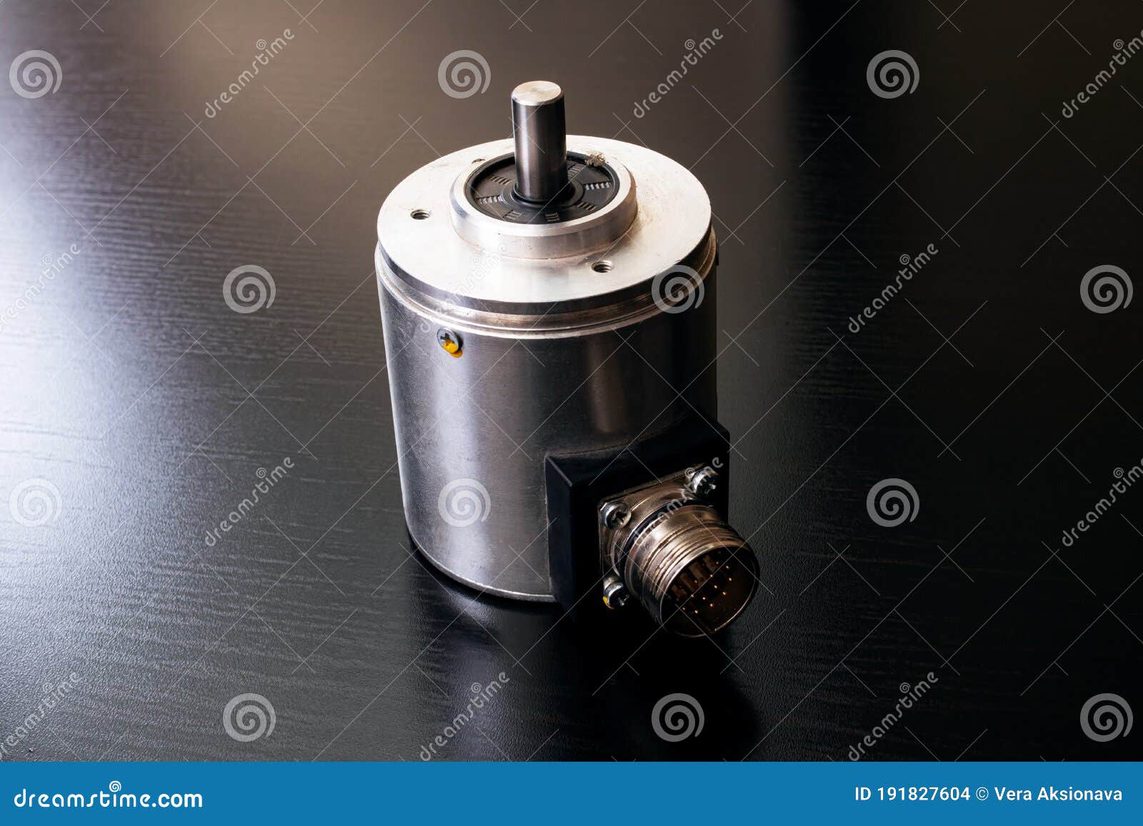 Metal Encoder on a Black Wooden Table Stock Photo - Image of motor ...