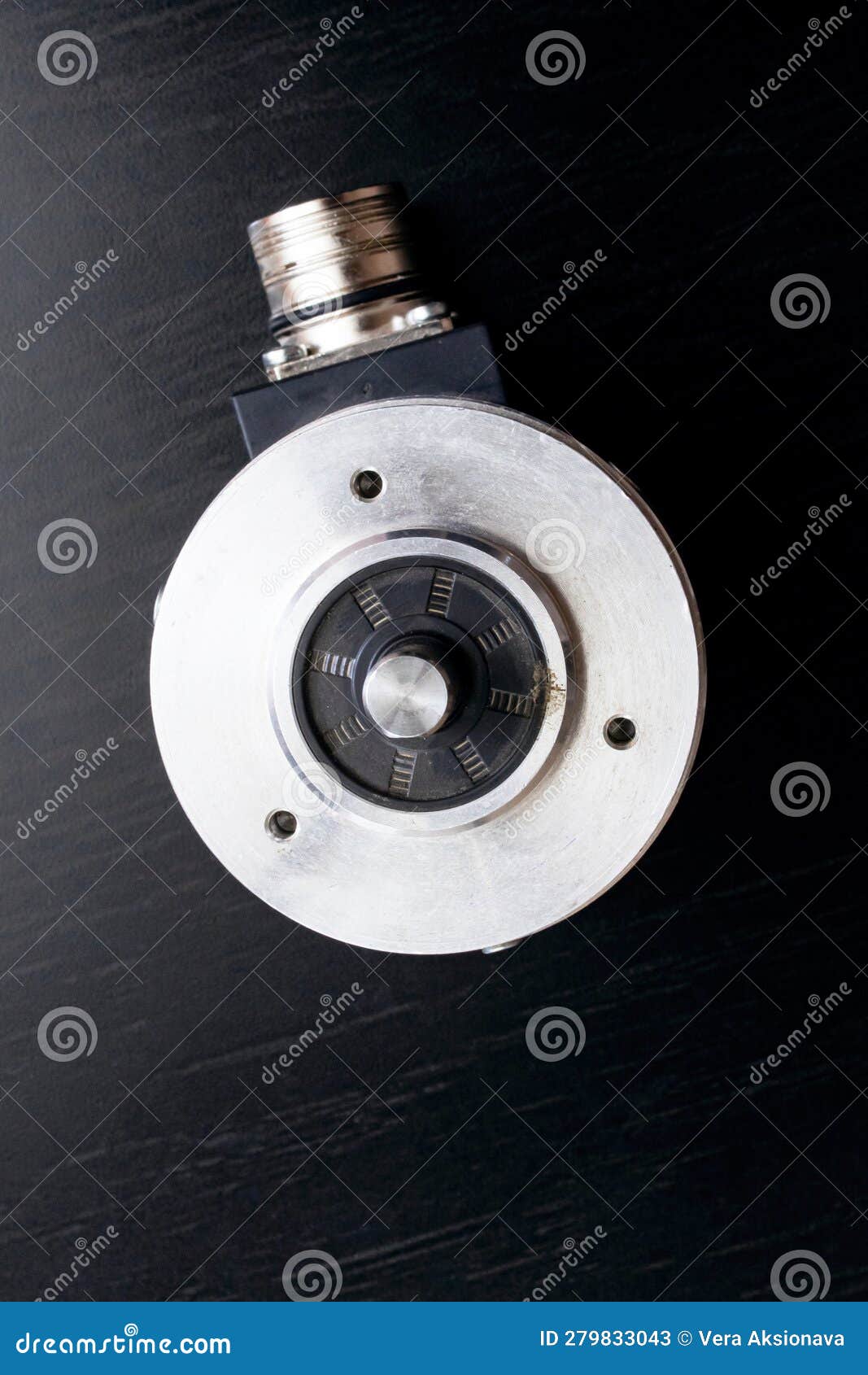 Metal Encoder on a Black Wooden Table Stock Image - Image of inverter ...