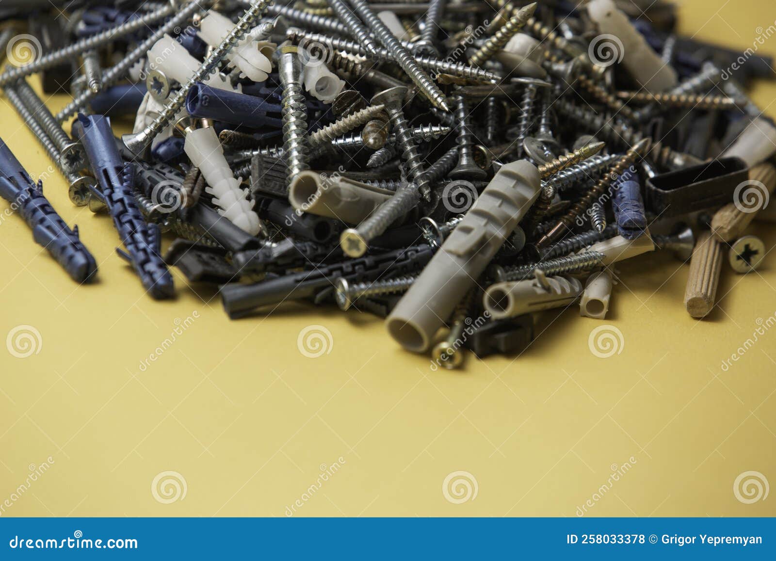 Metal Fasteners on a Yellow Background Stock Photo - Image of rivets ...