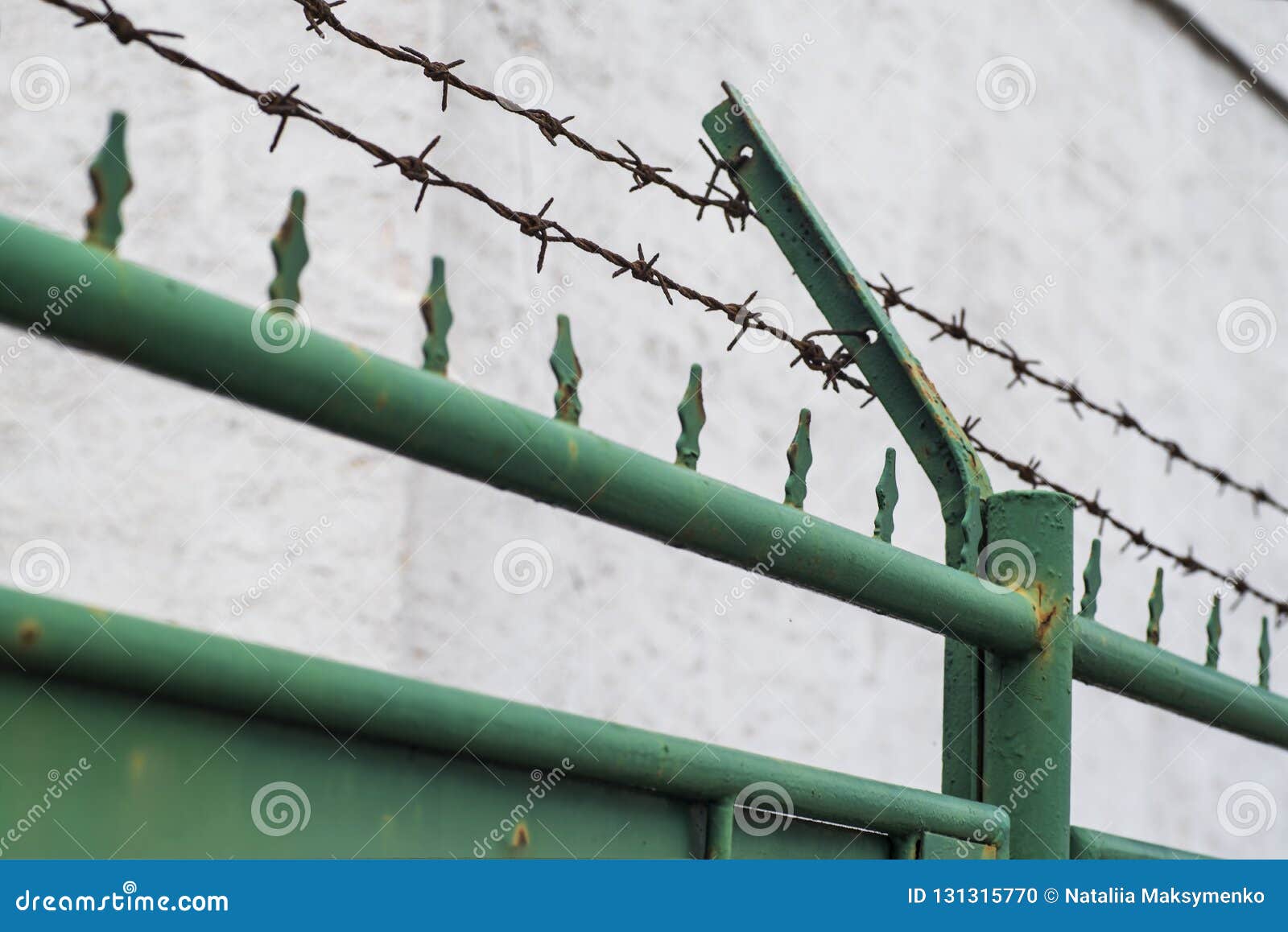 Metal Fence with Barbed Wire, Guarded Object. Stock Photo - Image of ...