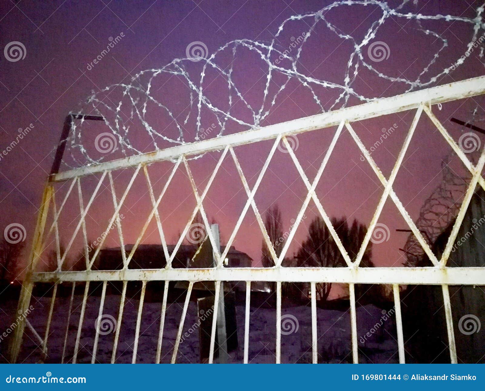 Metal Fence and Barbed Wire. Night Stock Photo - Image of border, dark ...