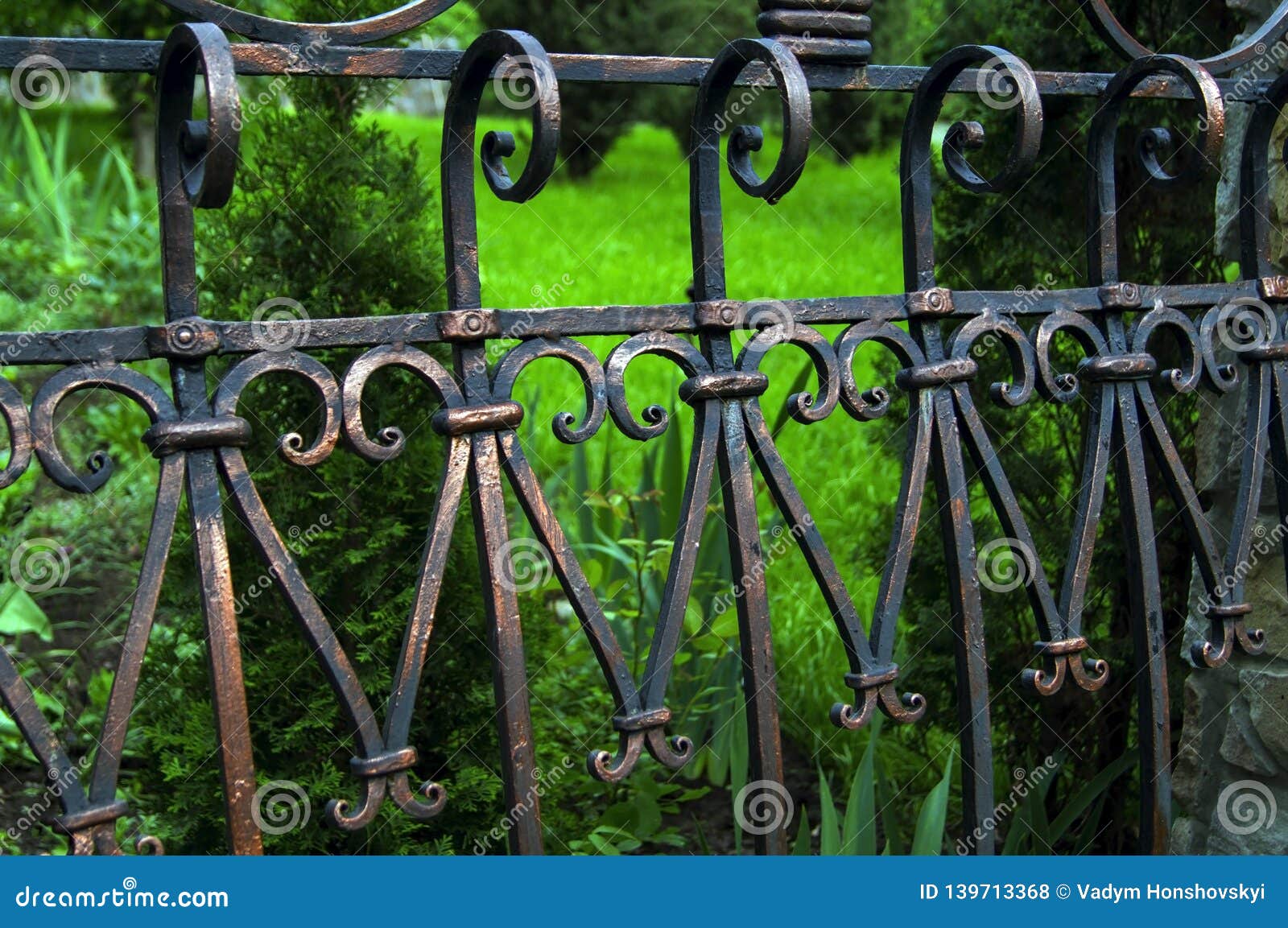 Metal Fence with Forged Elements Stock Photo - Image of forging ...