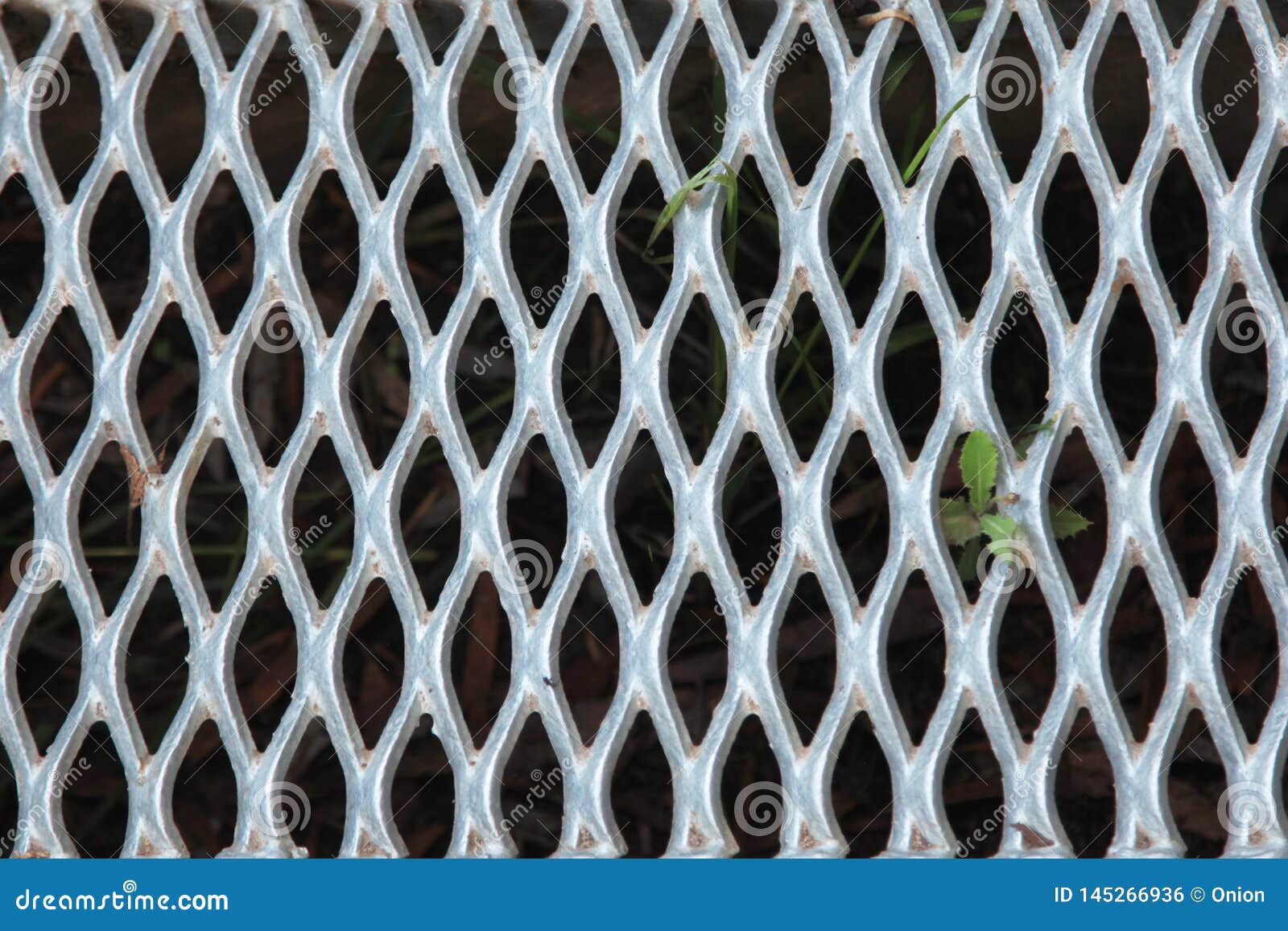 Metal Fence with an Interesting Pattern Stock Photo - Image of repeated ...