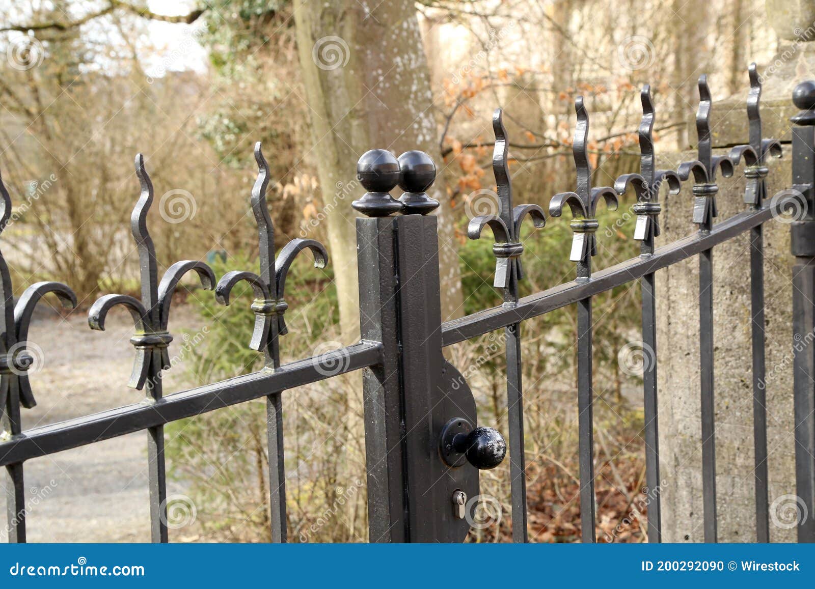 Metal fence in the park stock photo. Image of park, summer - 200292090