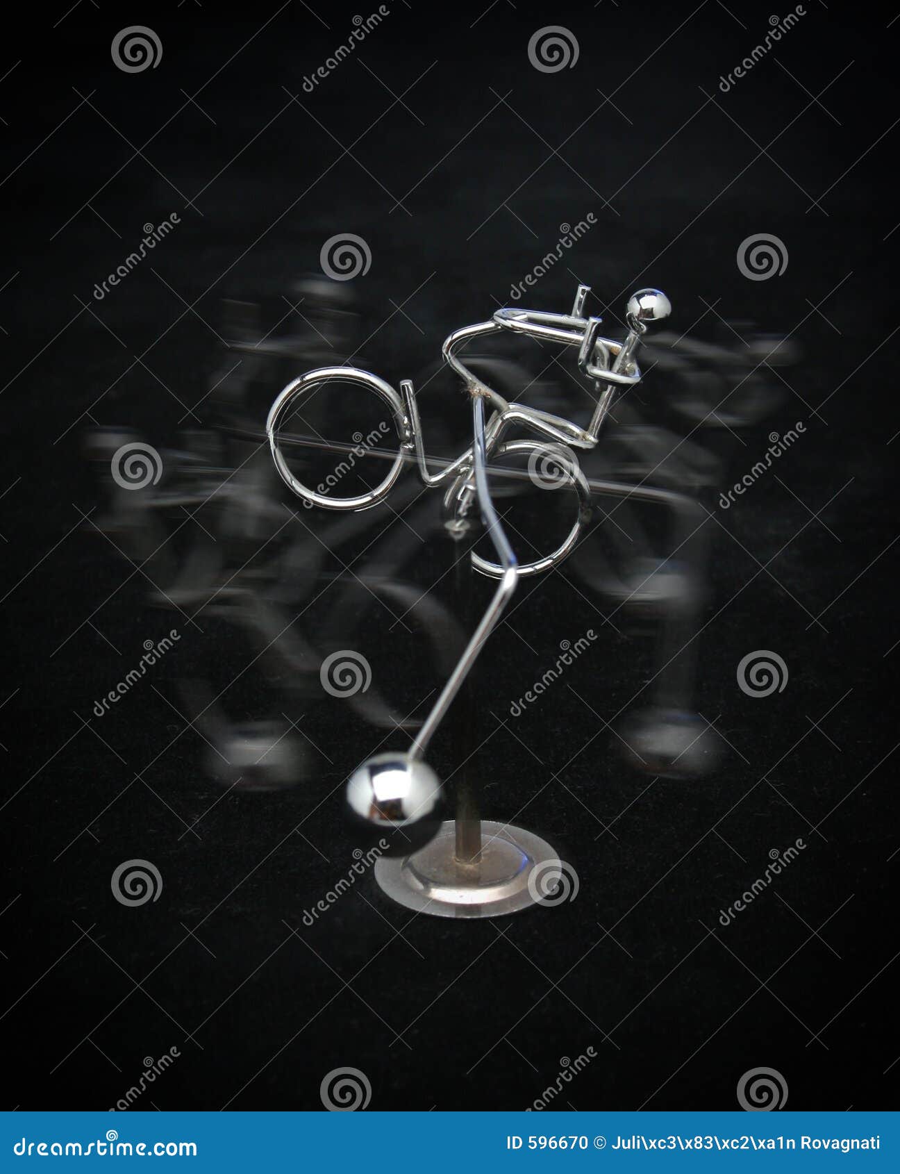 Metal Figure Riding a Bicycle Stock Photo - Image of balance, moving ...
