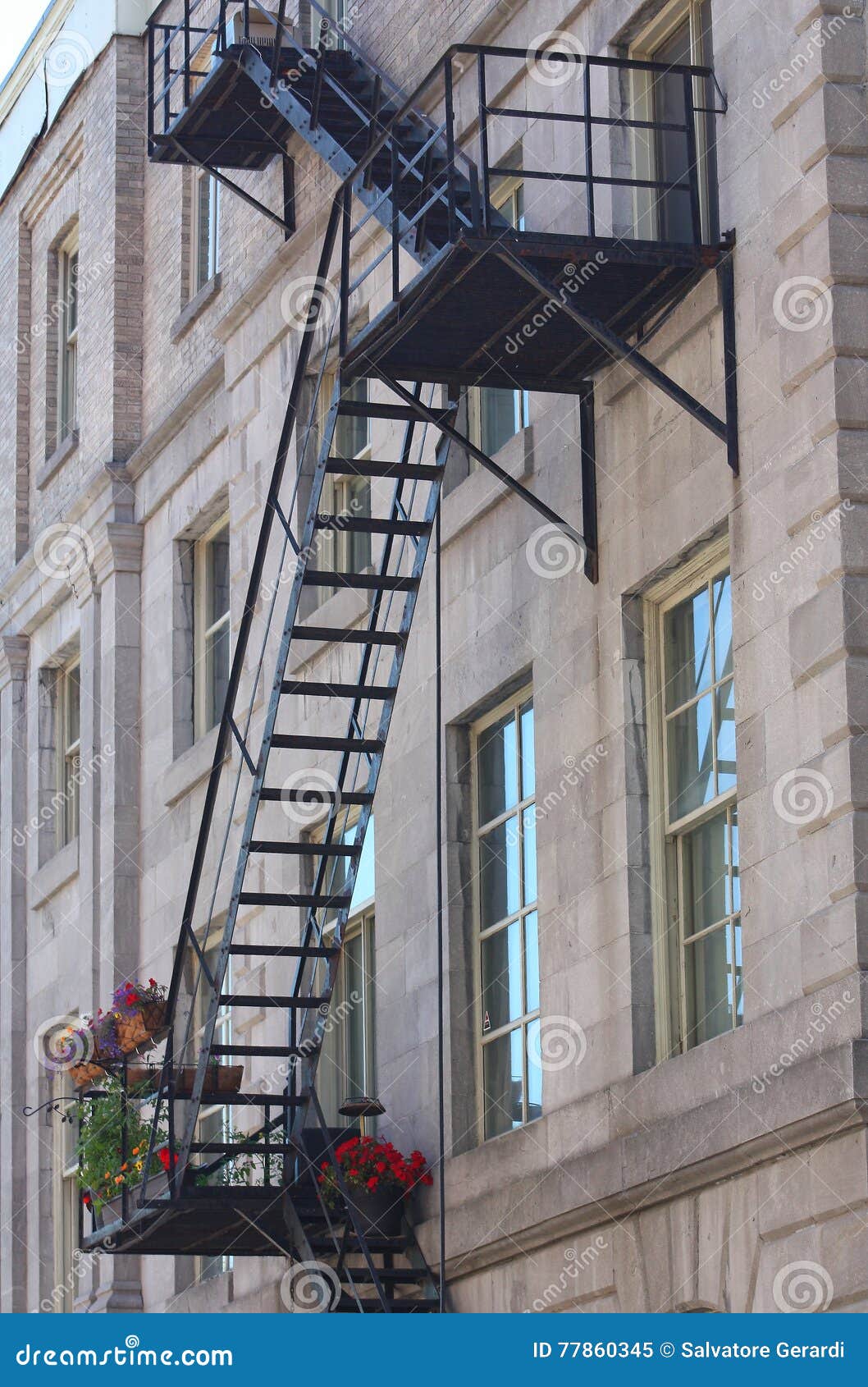 Metal Fire Emergency Exit Stairs Outside an Old Style Building Stock ...