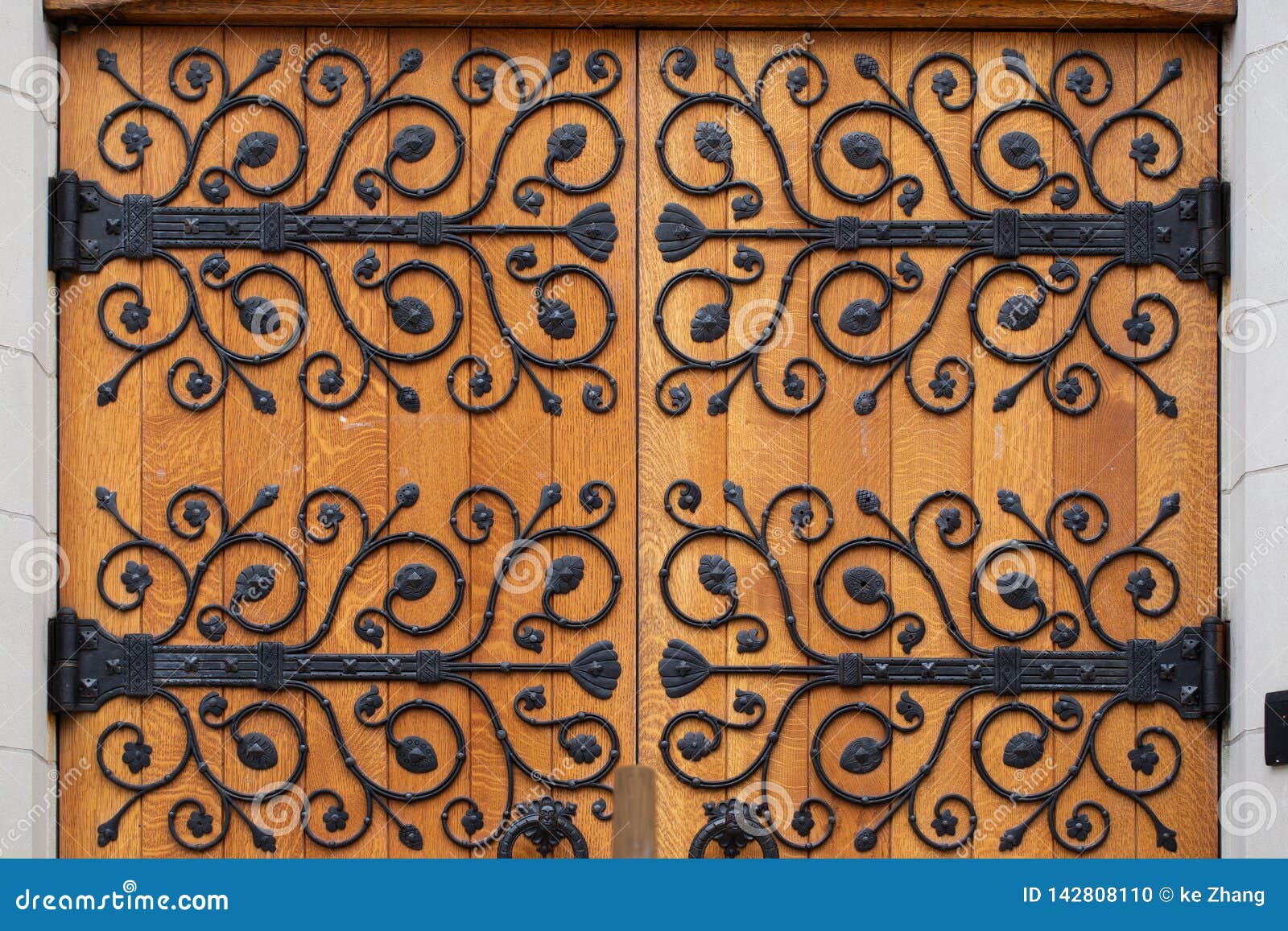 Metal Floral Pattern Ornament on Wooden Doors Stock Photo - Image of ...