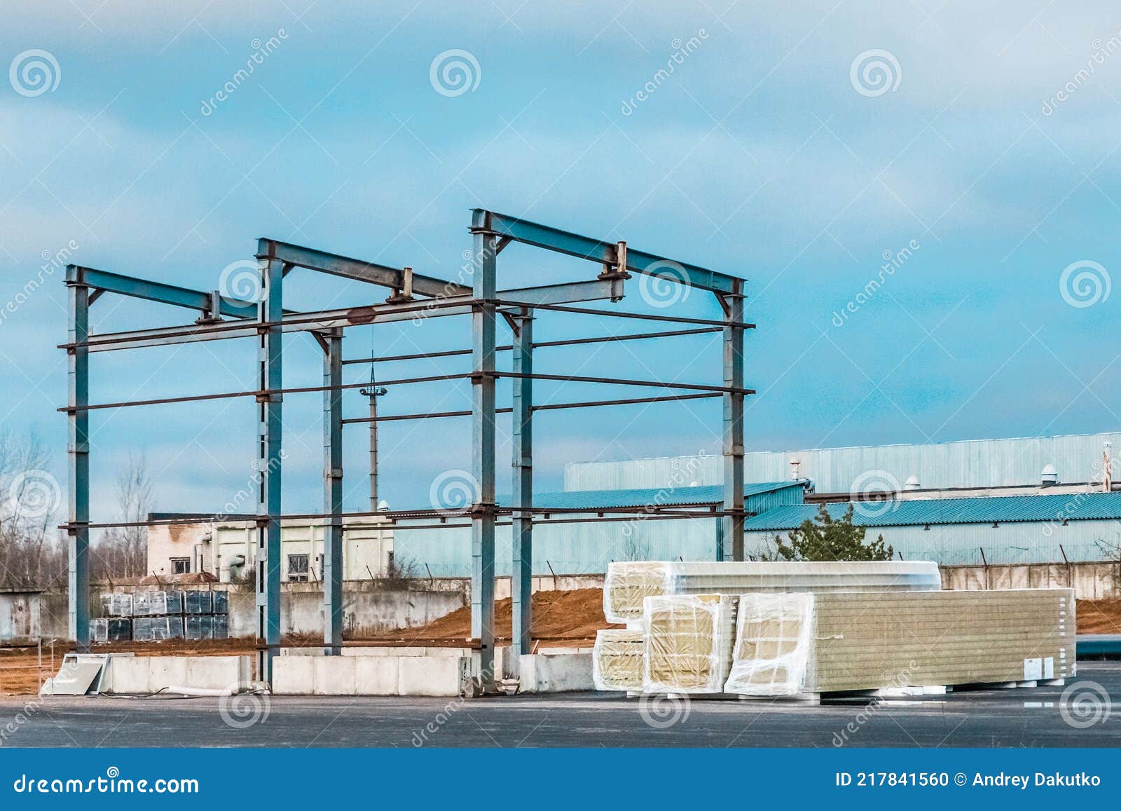 Metal Frame of a New Modern Building Under Construction and Packed ...