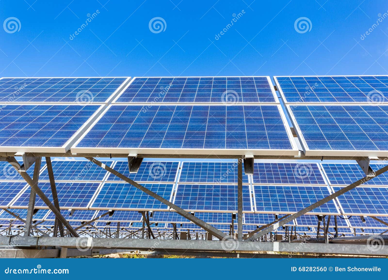 Metal Frames with Rows of Blue Solar Collectors and Sky Stock Photo ...