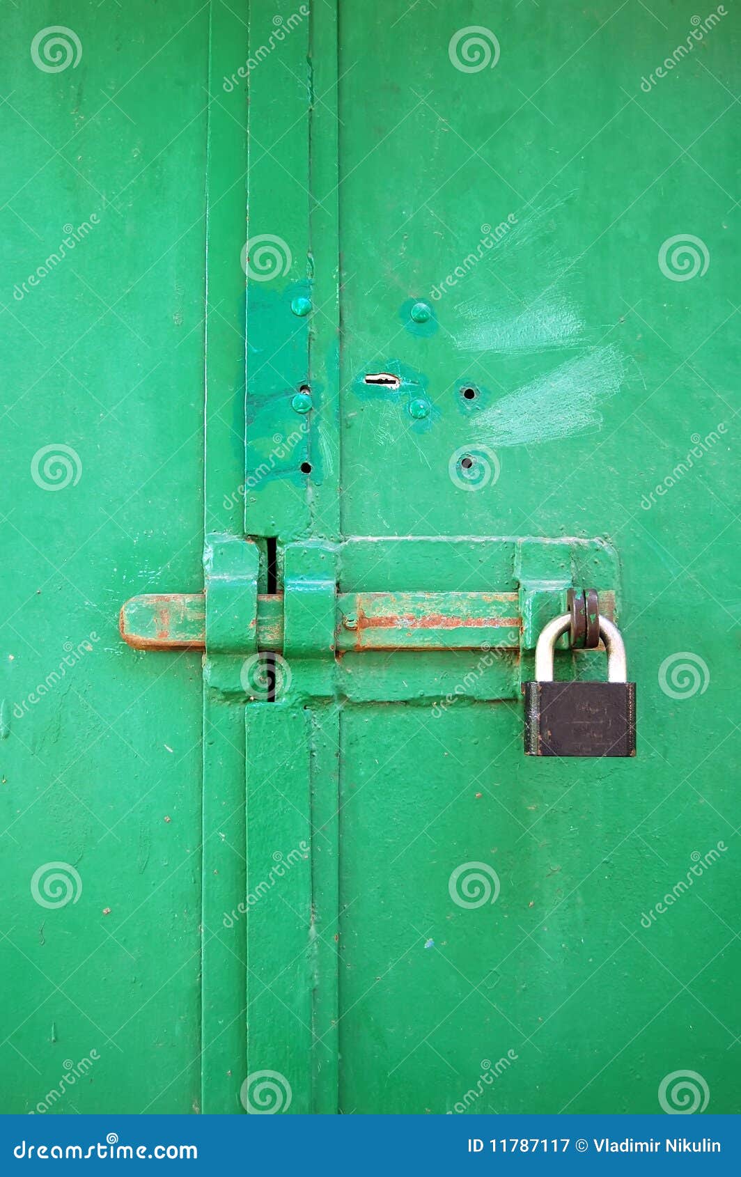 Metal Gate Lock on Green Gates. Stock Image - Image of aged, guard ...
