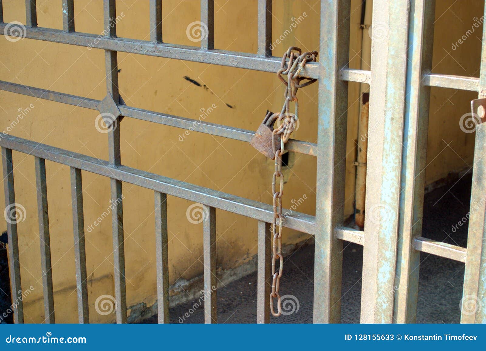 Open Metal Gates with the Old Lock on a Rusty Chain. Stock Image ...