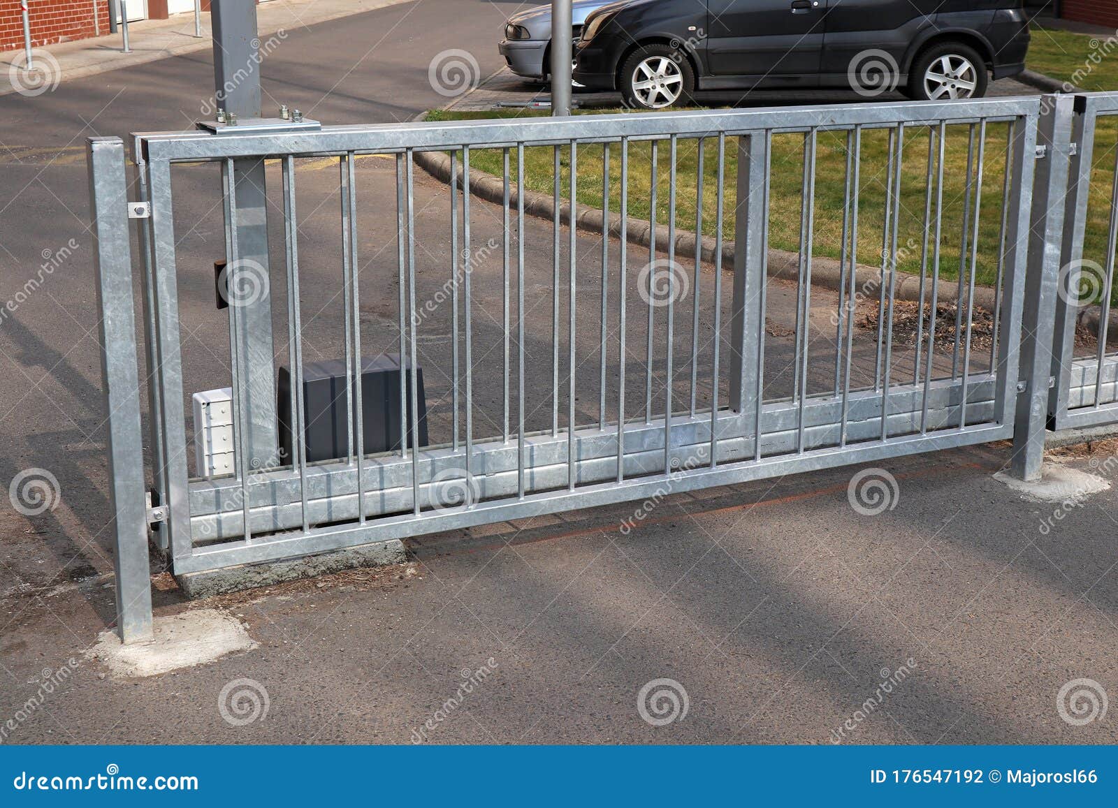 Metal Gate of the Parking Lot Stock Photo - Image of outdoors, road ...
