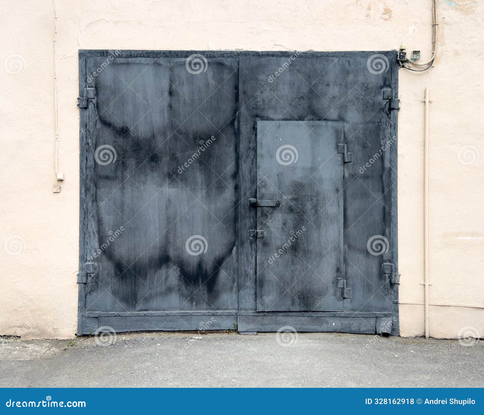 Metal Gate on the Wall of the Building Stock Photo - Image of ...